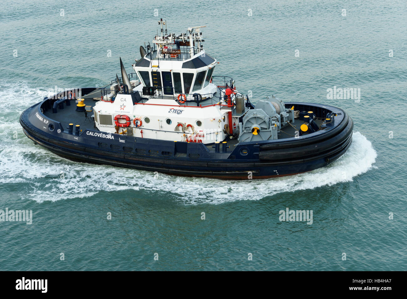 Calovebora Panama canal tugboat under power side view Stock Photo - Alamy