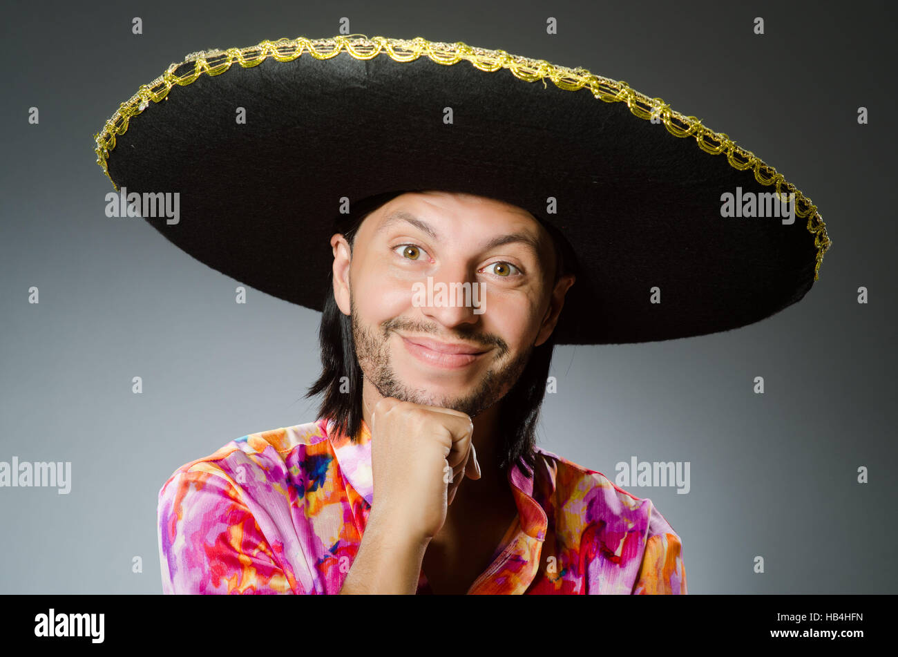 Young mexican man wearing sombrero Stock Photo - Alamy