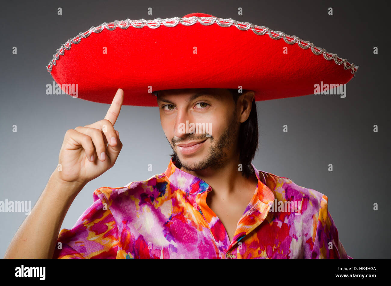 Young mexican man wearing sombrero Stock Photo - Alamy