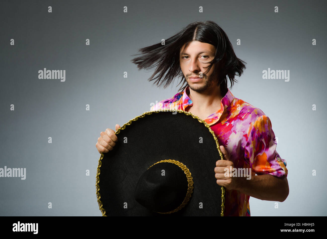 Young mexican man wearing sombrero Stock Photo - Alamy