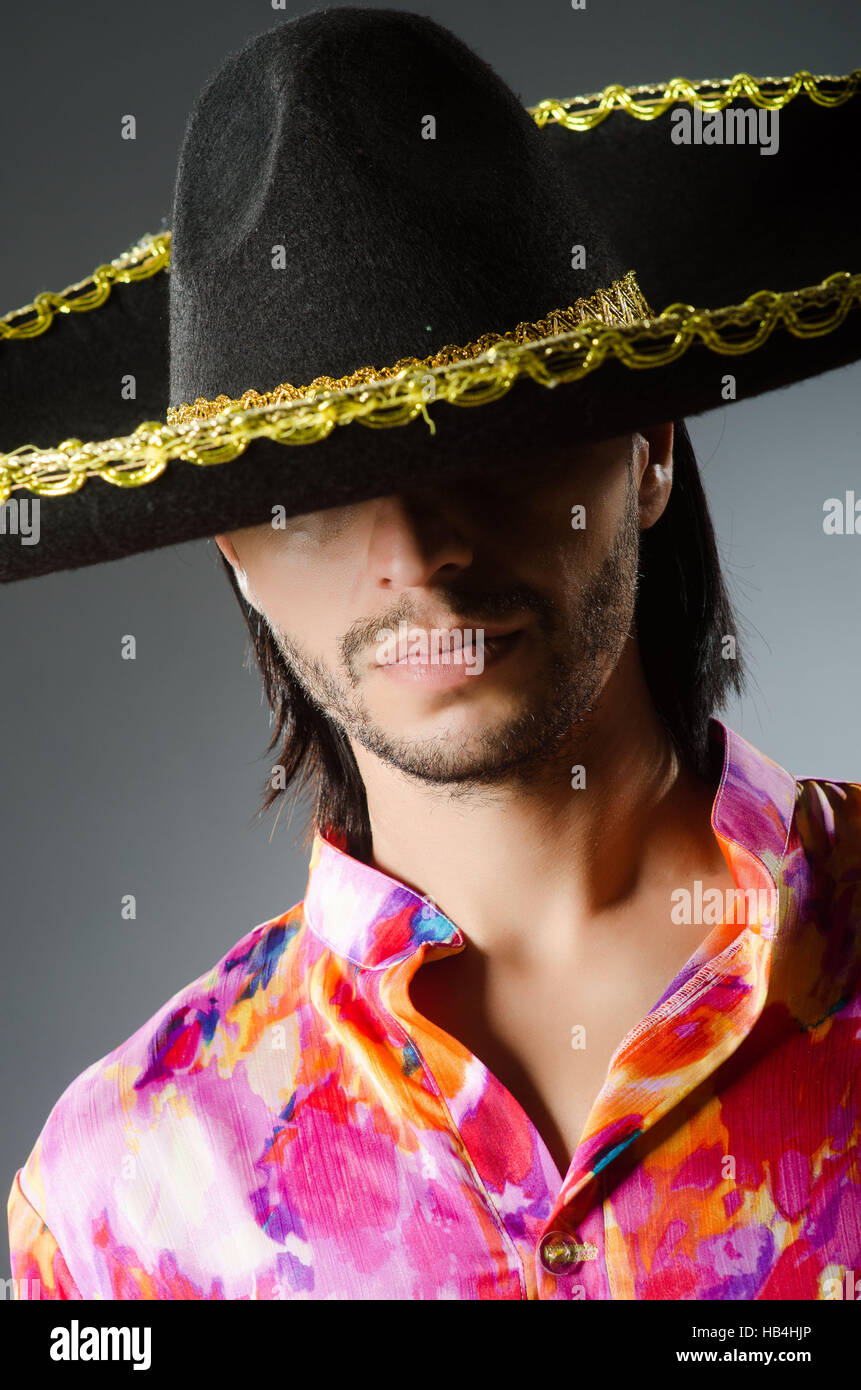 Young mexican man wearing sombrero Stock Photo - Alamy