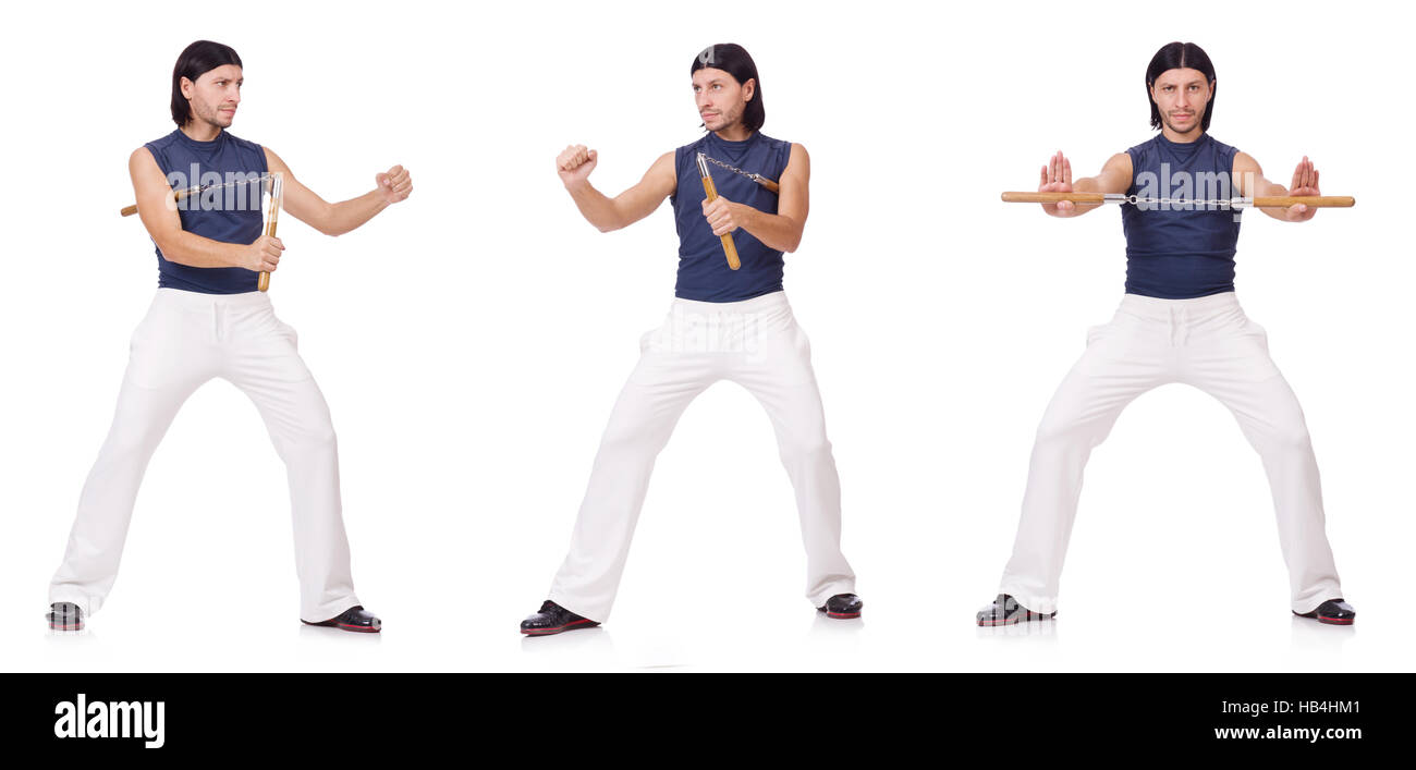 Funny karate fighter with nunchucks on white Stock Photo - Alamy