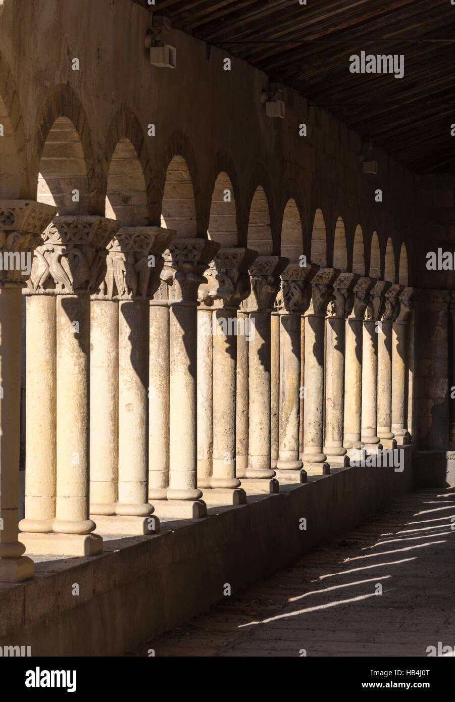 The Romanesque, arcaded portico of San Martin church, in the Plaza ...