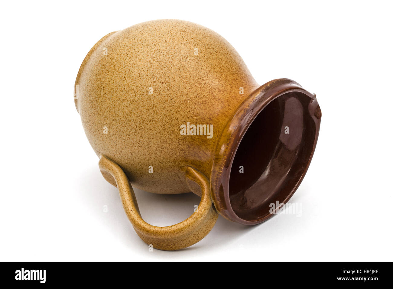 Old pitcher, isolated on white background Stock Photo - Alamy