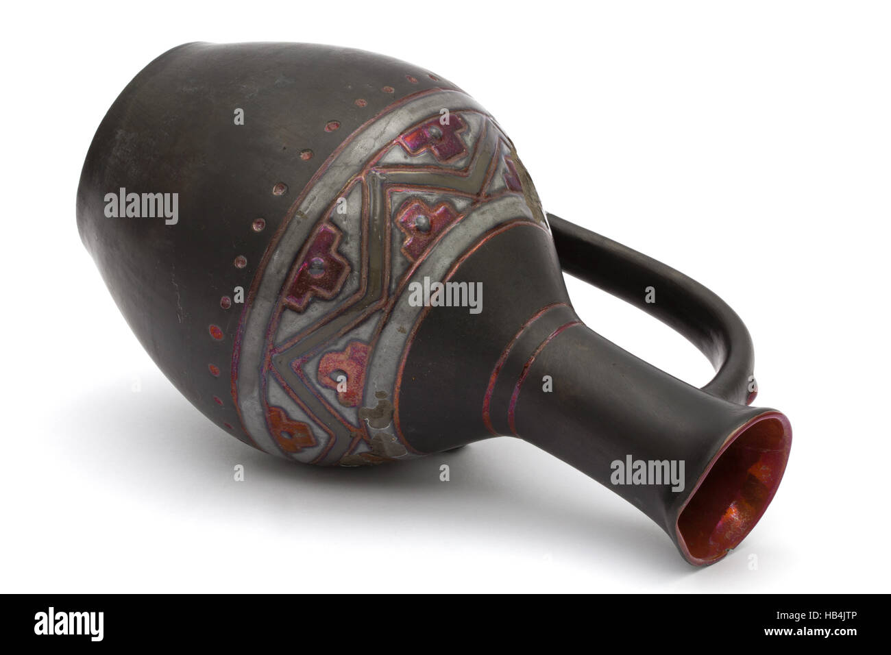 Old pitcher, isolated on white background Stock Photo - Alamy