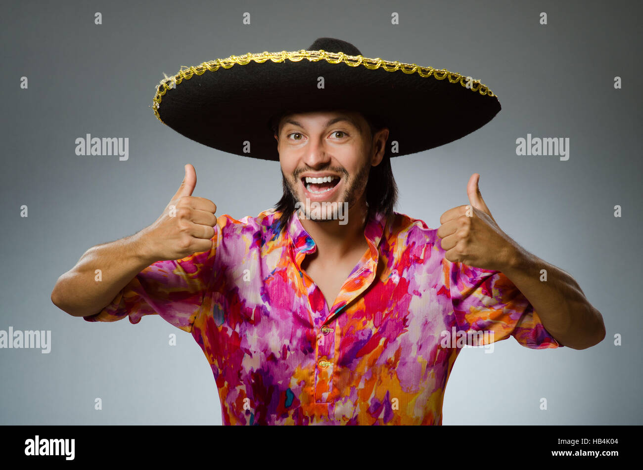 Young mexican man wearing sombrero Stock Photo - Alamy