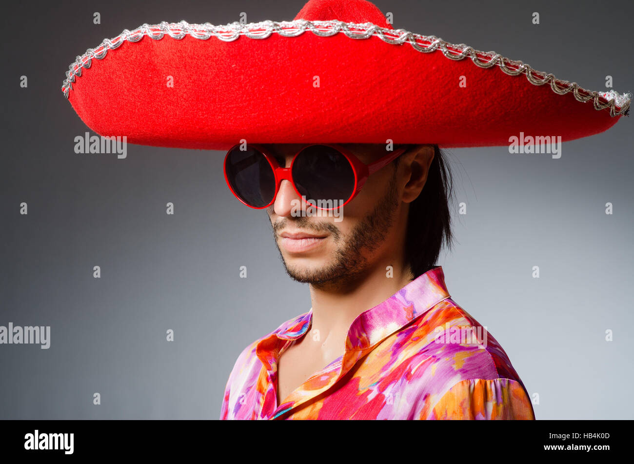 Young mexican man wearing sombrero Stock Photo - Alamy