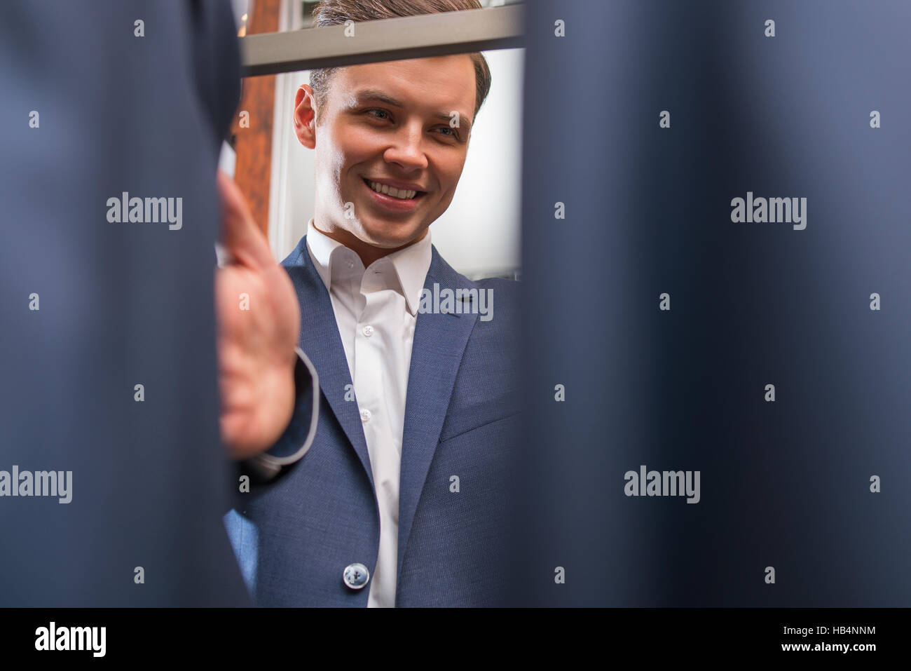 Man in store Stock Photo - Alamy