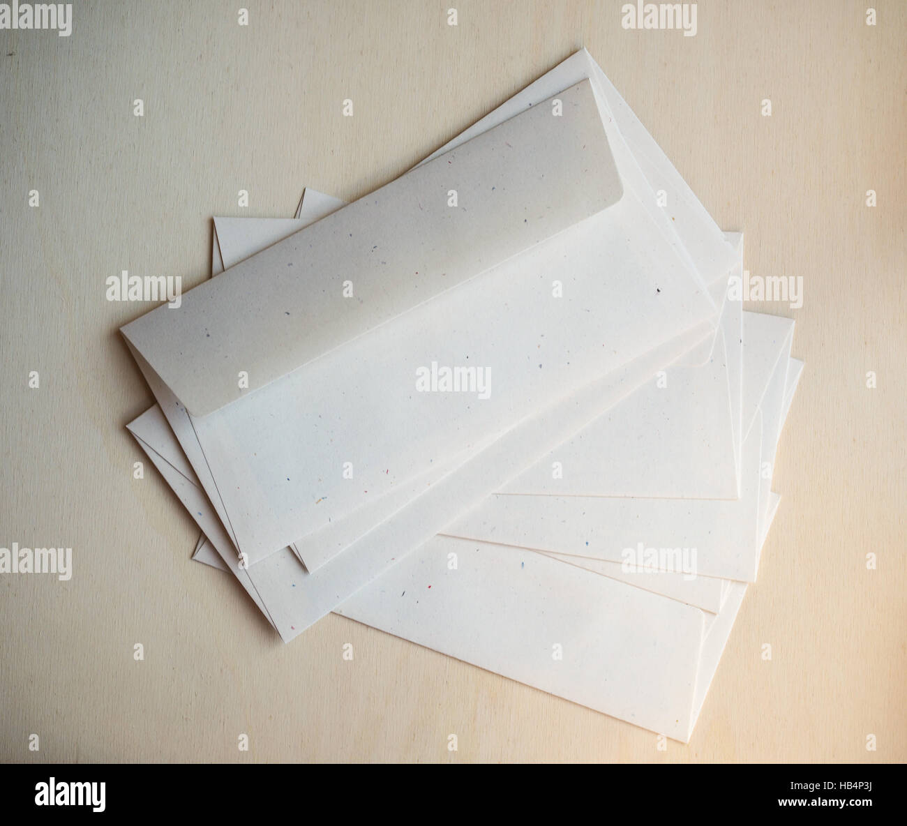 Letter envelope on wood table Stock Photo - Alamy