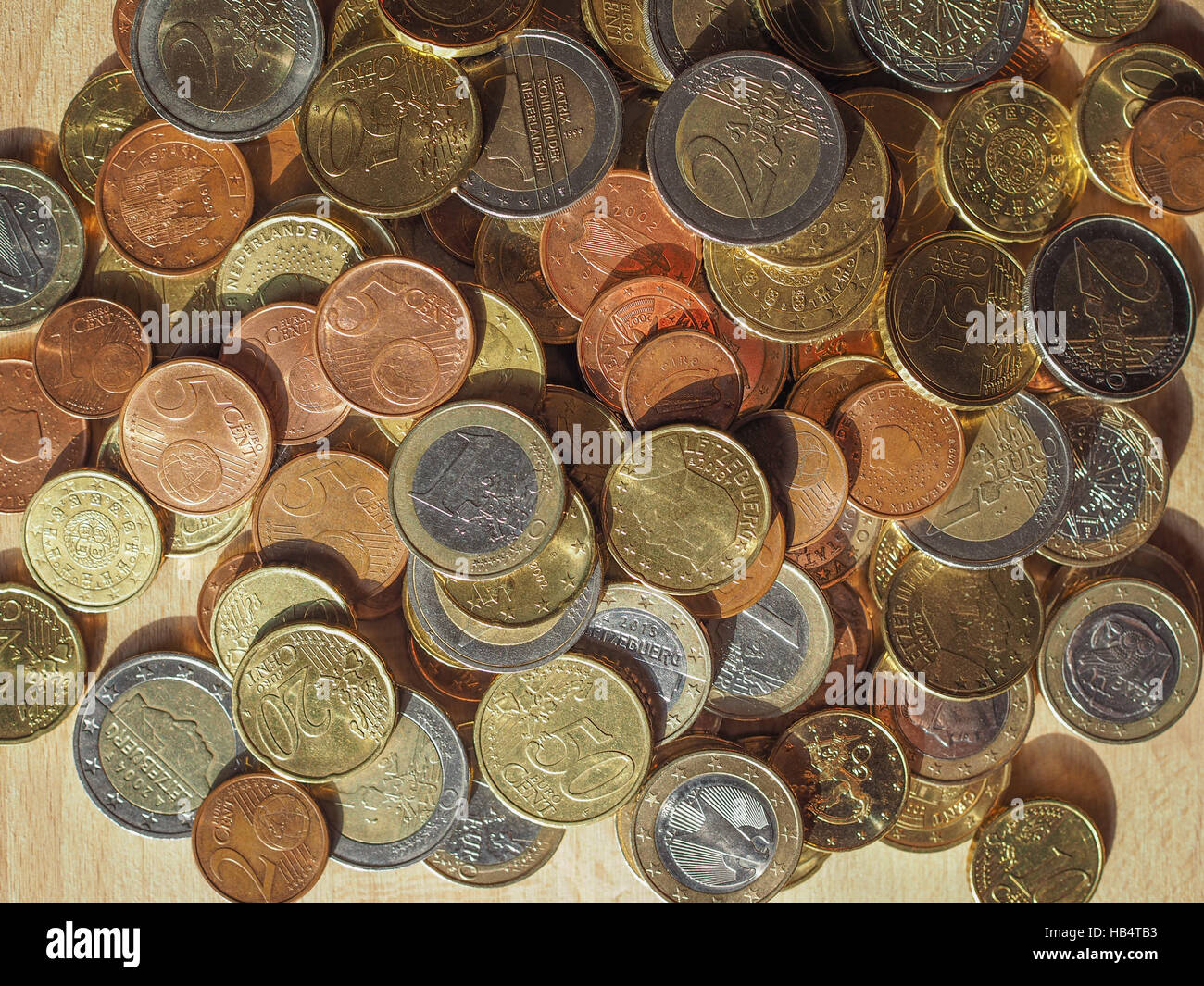 Many Euro coins Stock Photo - Alamy