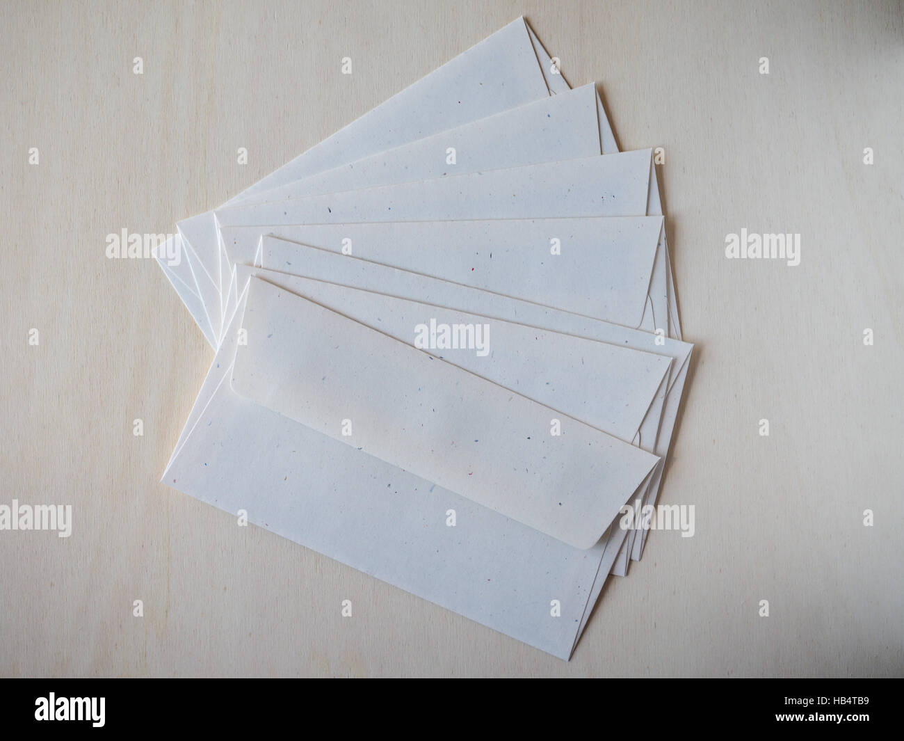 Letter envelope on wood table Stock Photo - Alamy