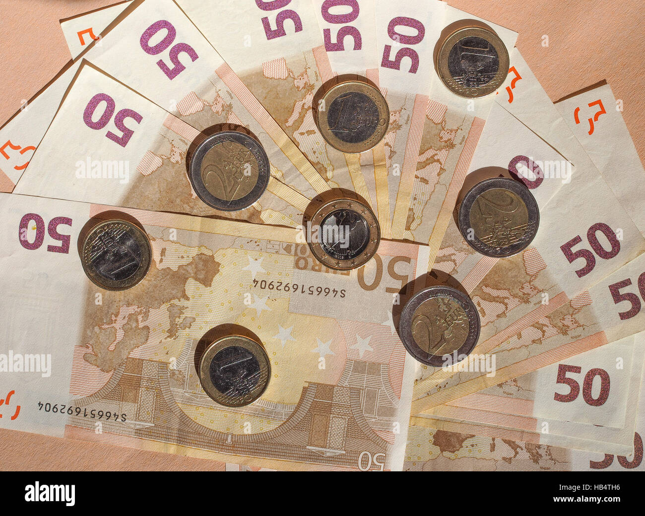 Euro coins and notes Stock Photo - Alamy