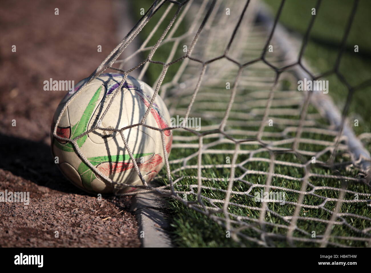 Soccer ball in net hi-res stock photography and images - Alamy