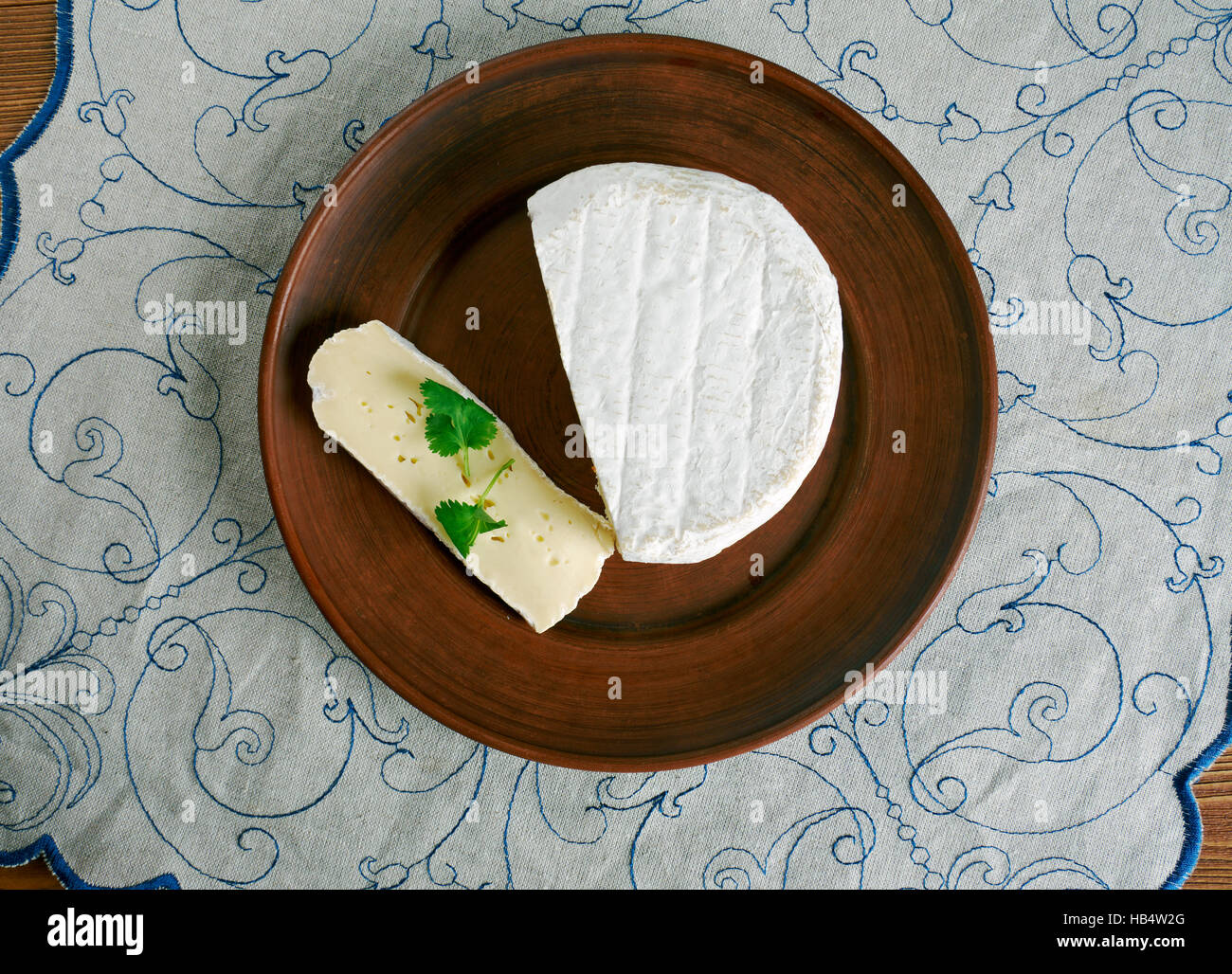 Round Brie cheese Stock Photo - Alamy