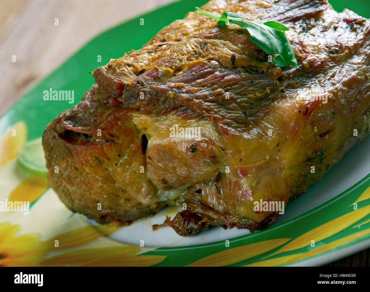 Pork braised Maiale al Latte Stock Photo - Alamy