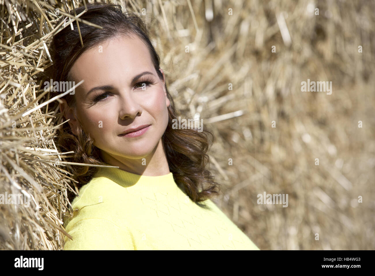 woman wearing yellow fall outfit Stock Photo - Alamy