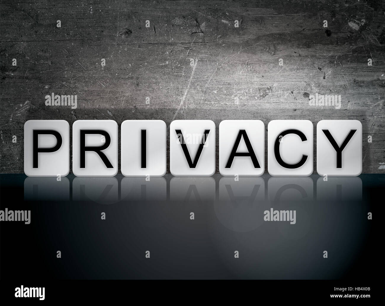 The word "Privacy" written in white tiles against a dark vintage grunge ...