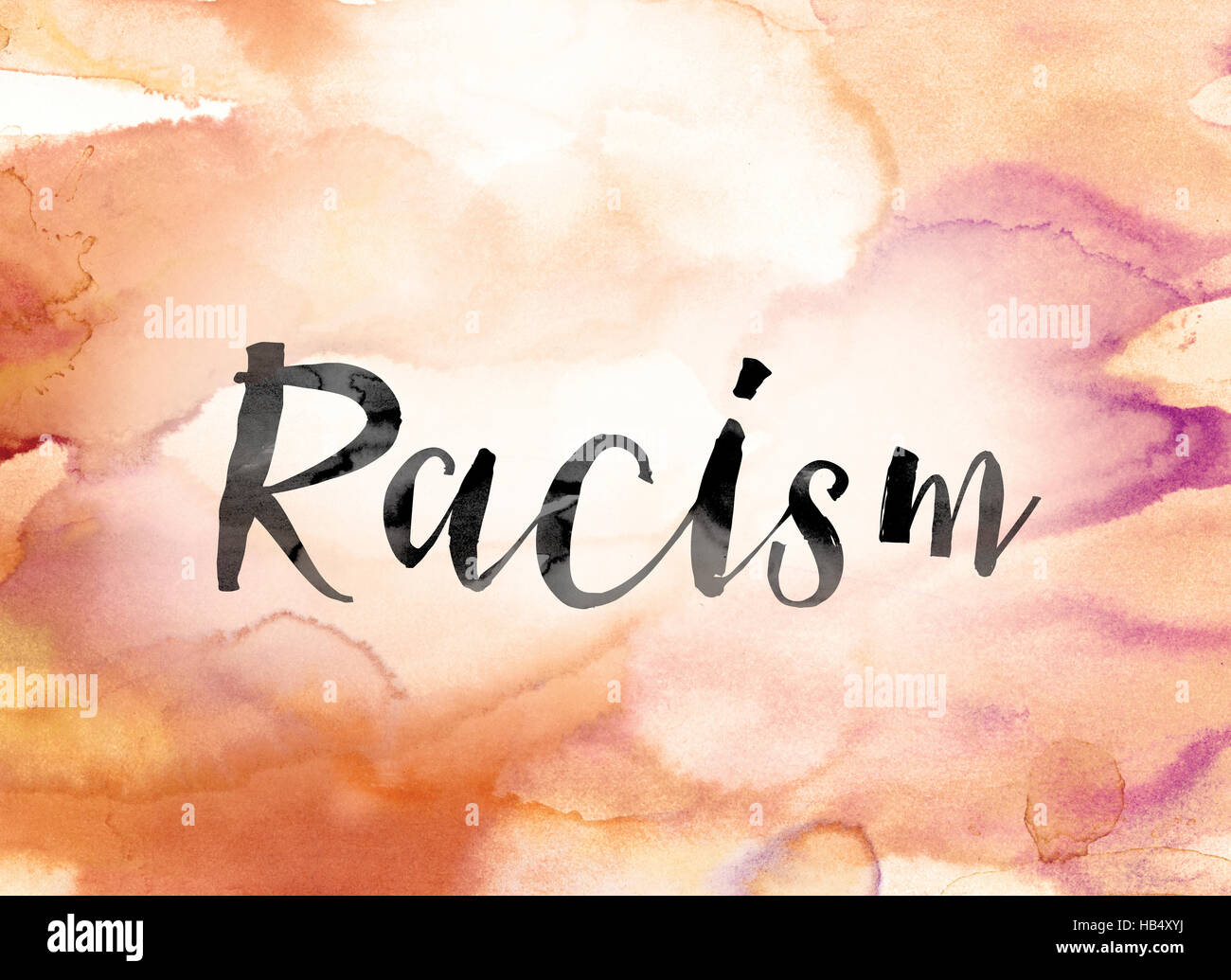 The word "Racism" painted in black ink over a colorful watercolor ...