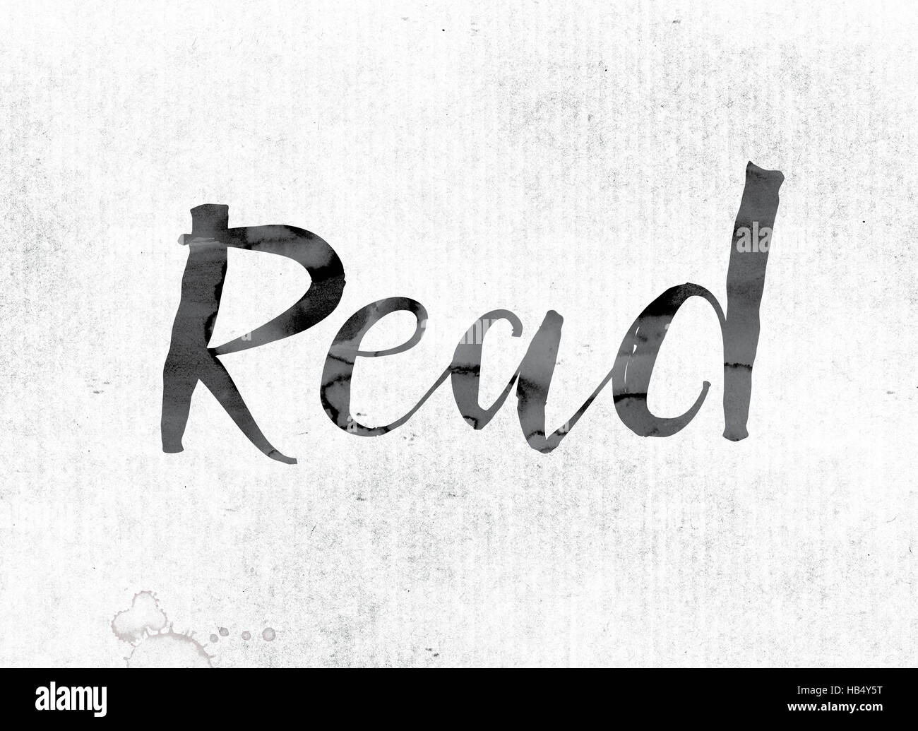 The word "Read" concept and theme painted in watercolor ink on a white ...