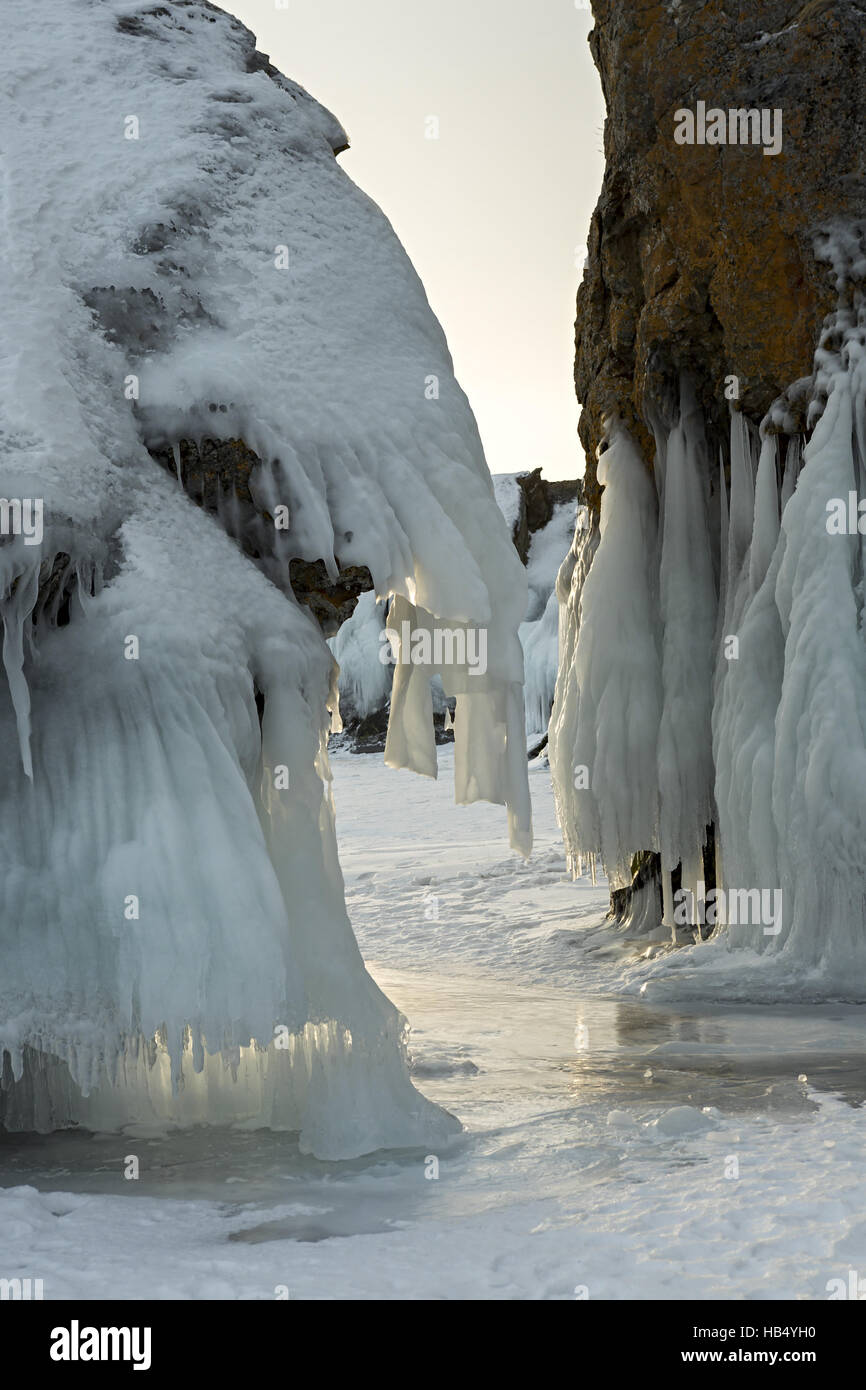 Beautiful icicles on rocks Stock Photo - Alamy