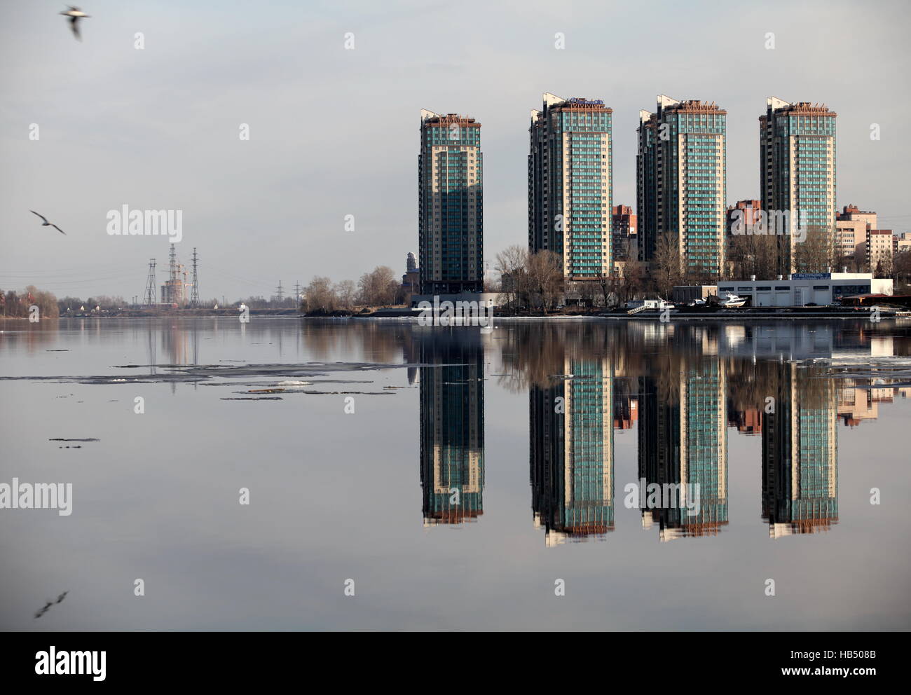 Skyline skyscrapers reflected in the water Stock Photo - Alamy