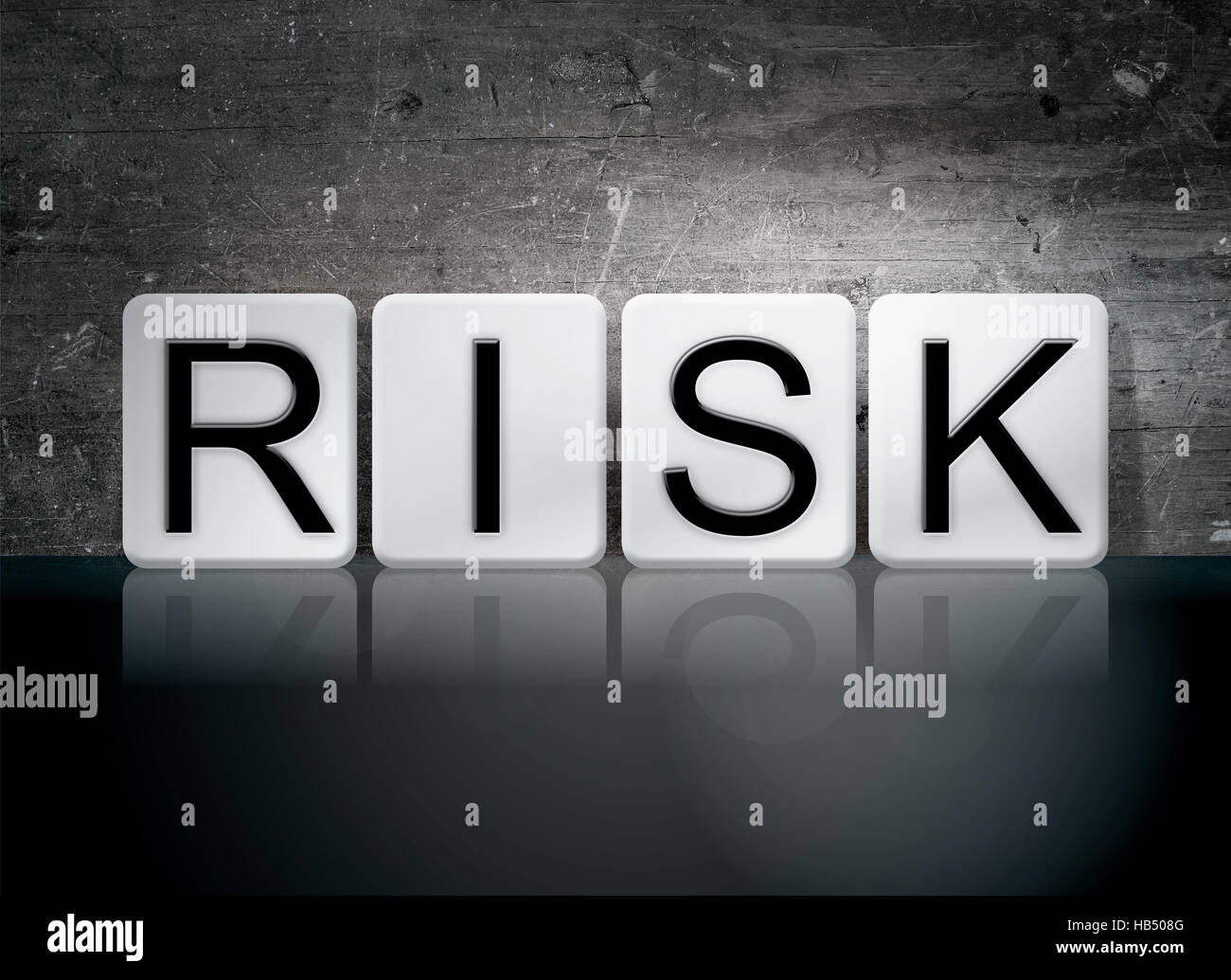 The word "Risk" written in white tiles against a dark vintage grunge ...