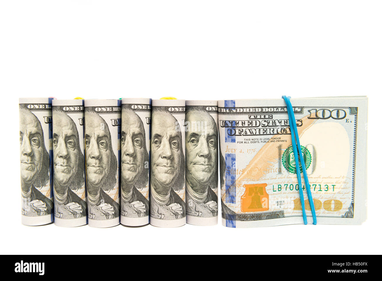Packs of hundred dollar bills grouped together, isolated with copy ...