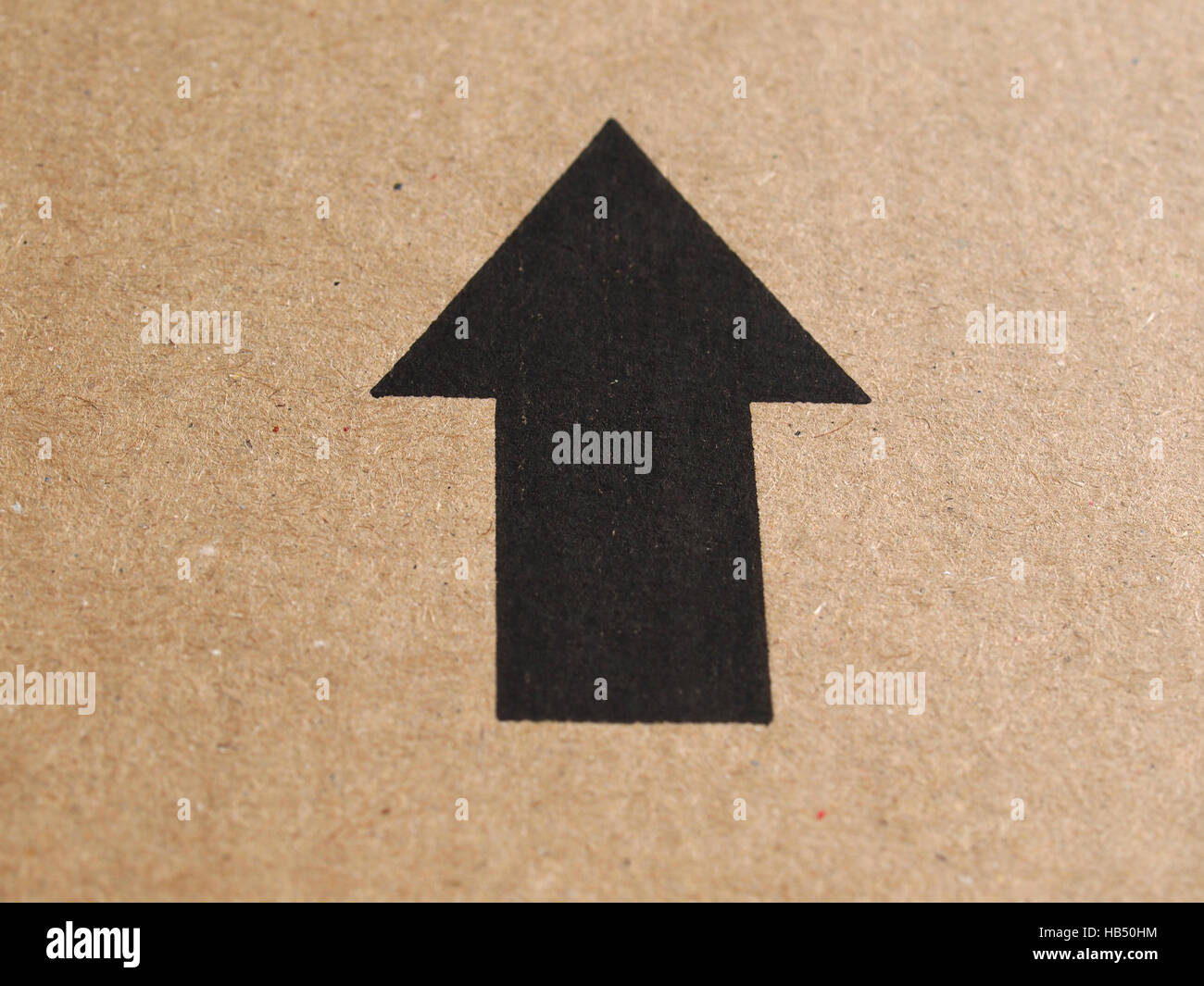 Black arrow on cardboard Stock Photo - Alamy Black arrow on cardboard Stock Photo - Alamy
