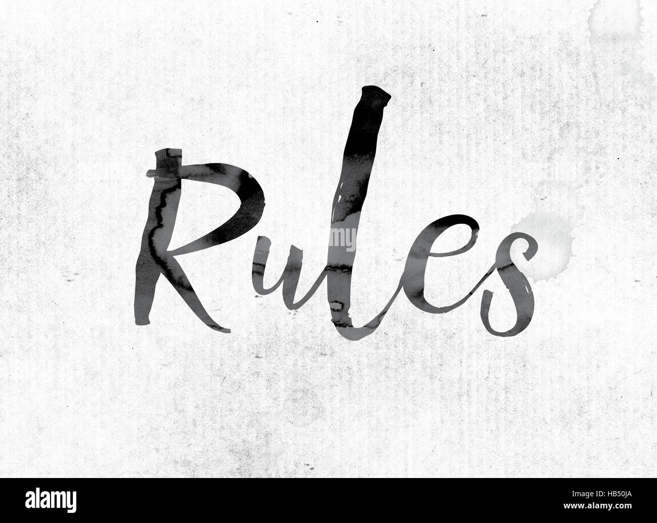 The word "Rules" concept and theme painted in watercolor ink on a white ...