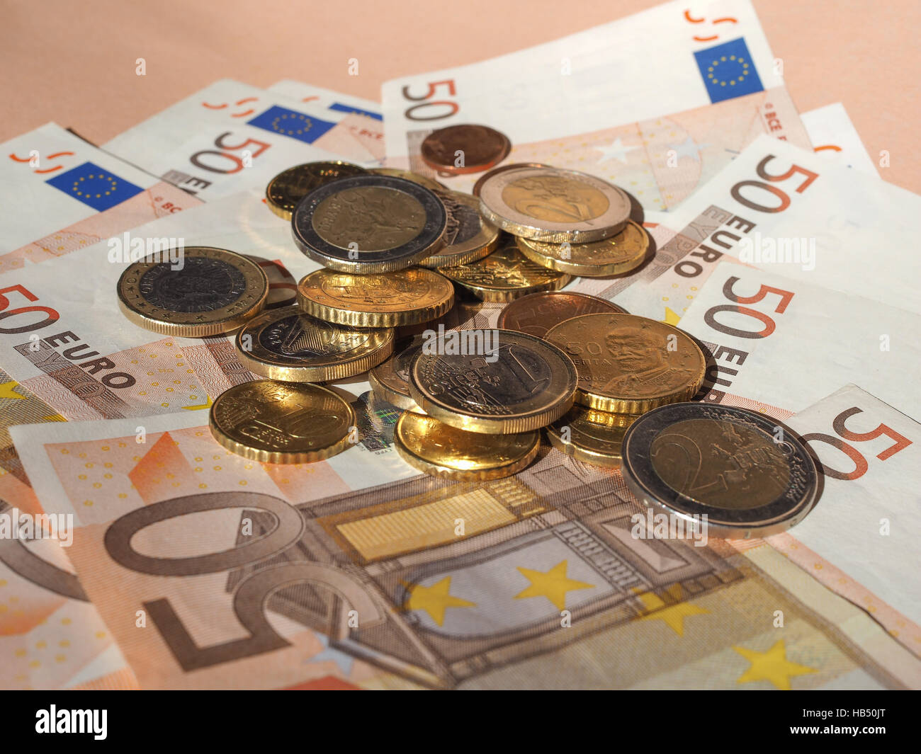 Euro coins and notes Stock Photo - Alamy