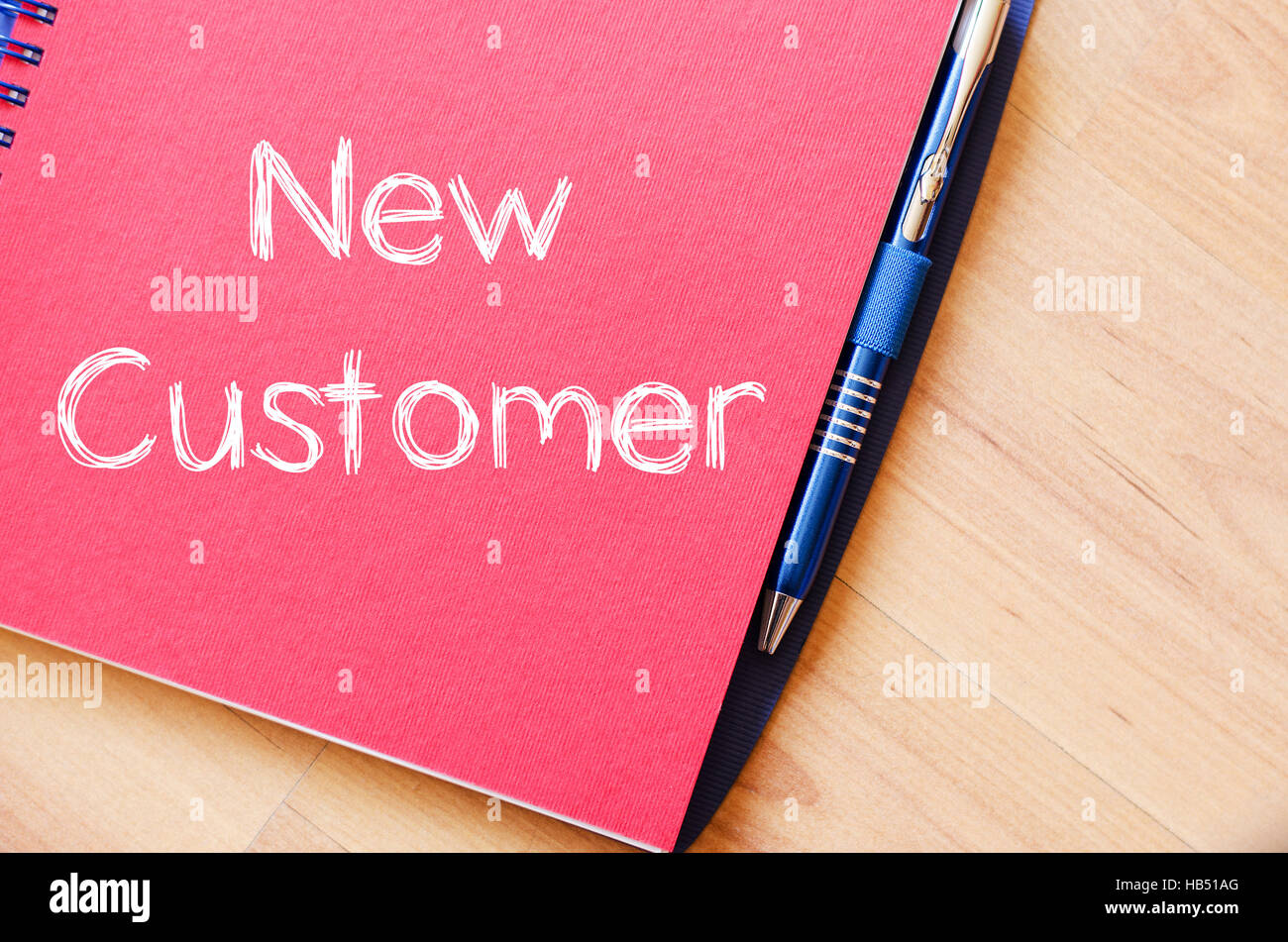 New customer text concept write on notebook Stock Photo - Alamy
