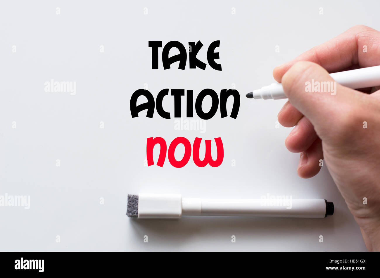 Human hand writing take action now on whiteboard Stock Photo - Alamy