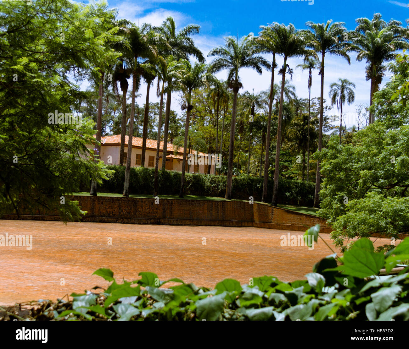 A brazillian coffee farmhouse from 1900's with drying field on the ...