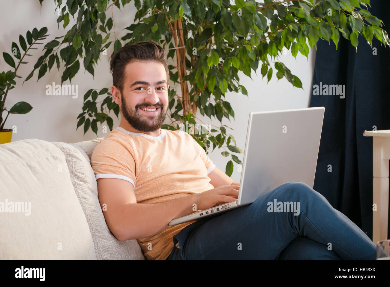 Freelance man working at home Stock Photo - Alamy