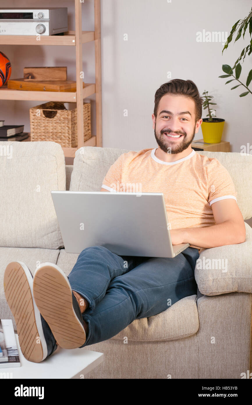 Freelance man working at home Stock Photo - Alamy