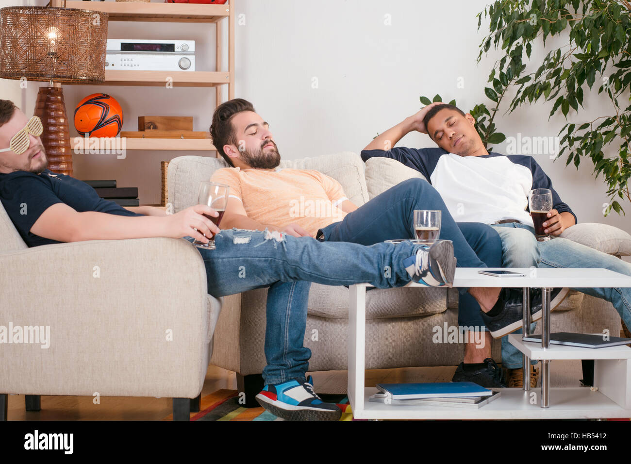 Watching soccer tv cheering night hi-res stock photography and images ...