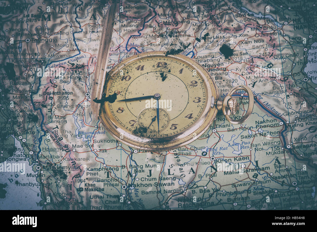 Photo of old watch on map Stock Photo - Alamy