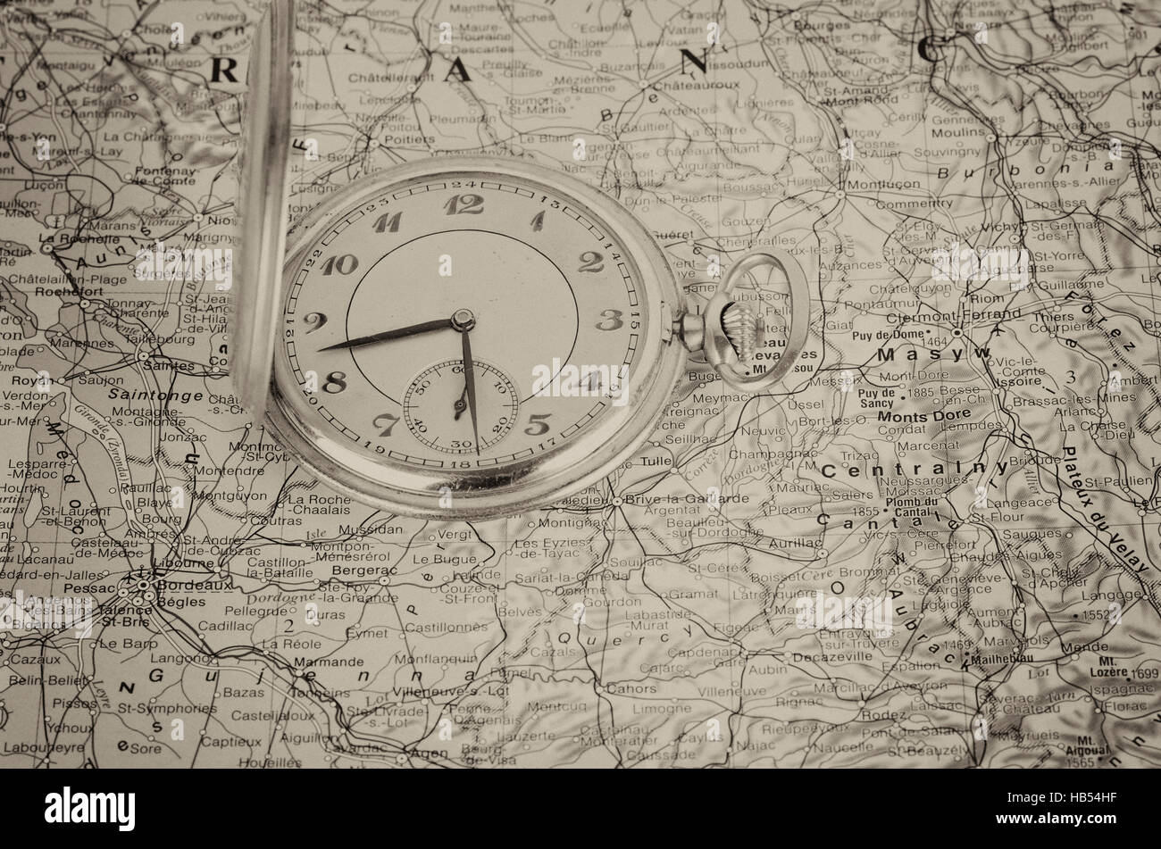 Photo of old watch on map Stock Photo - Alamy