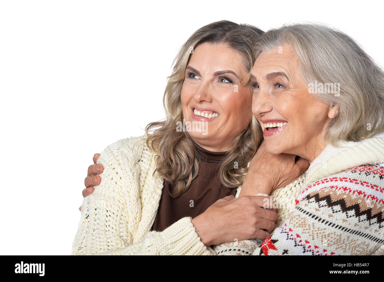 Two women embracing Stock Photo - Alamy