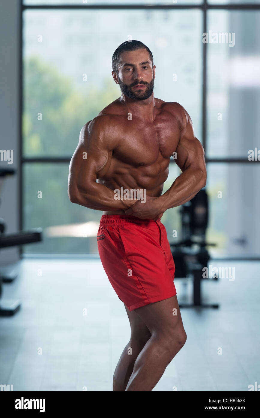 Portrait Of A Young Physically Fit Hispanic Man Showing His Well ...