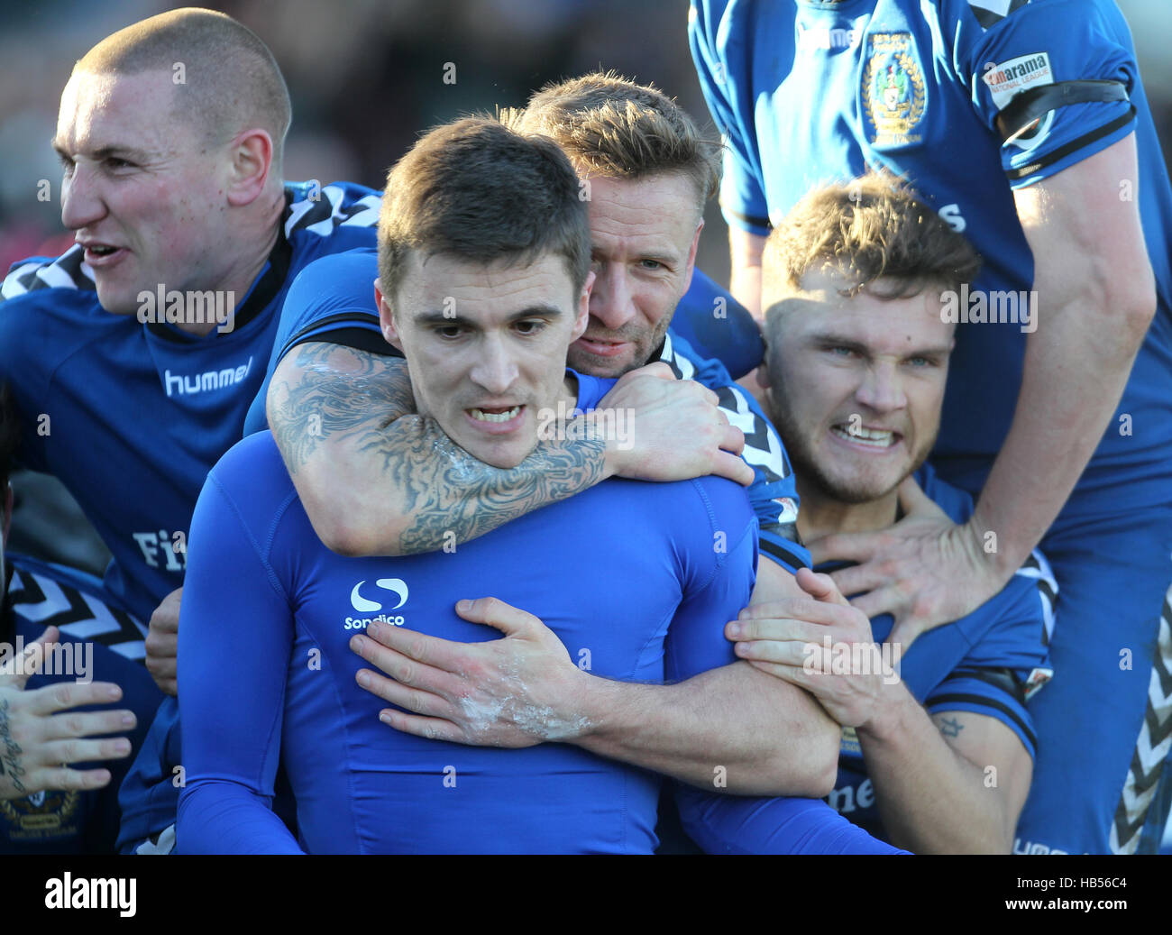 Curzon Ashton's Adam Morgan celebrates scoring his side's third goal of ...