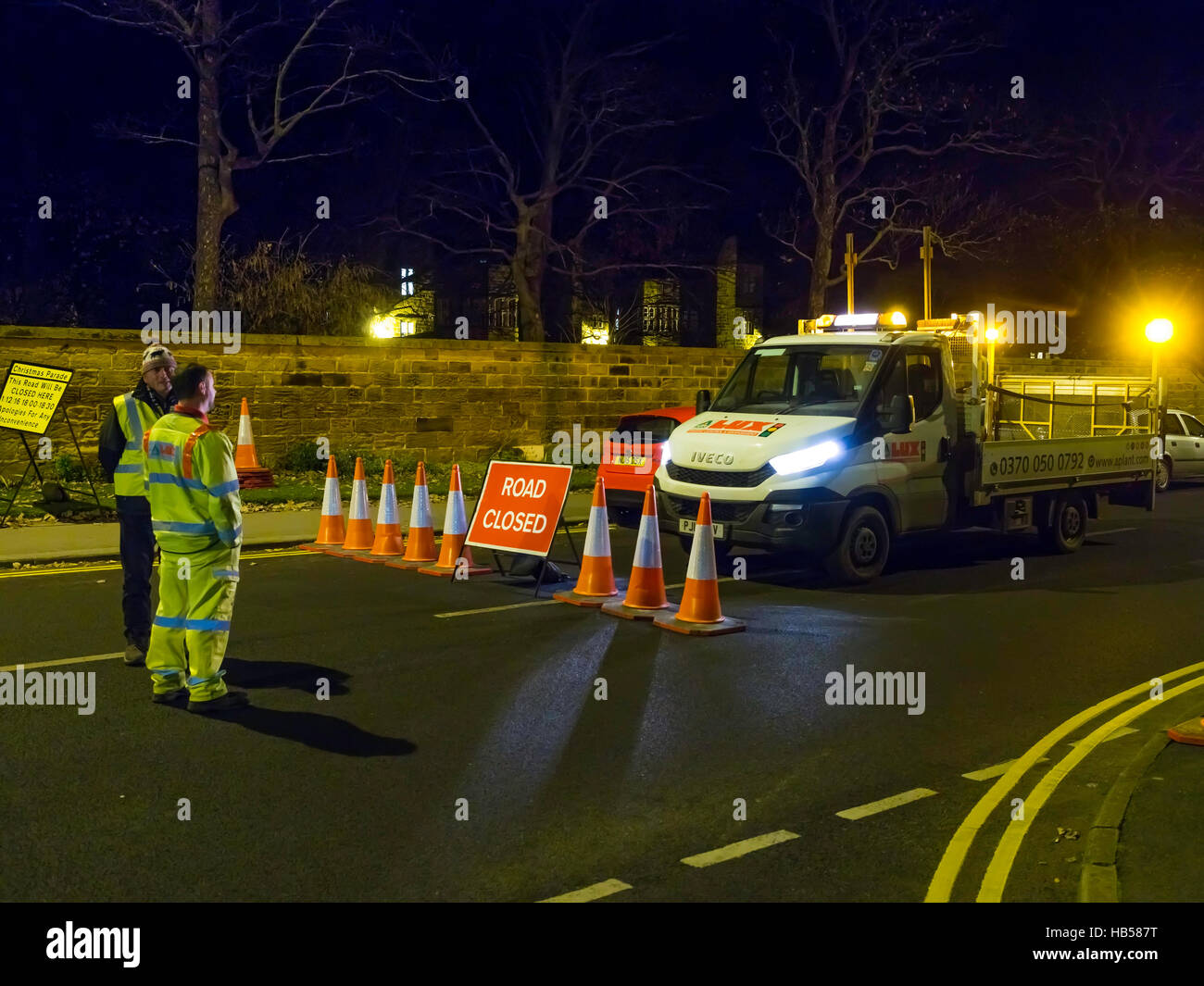Temporary traffic control using notices and cones to close the road for ...