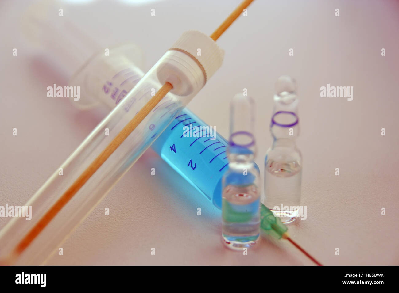 Syringe and ampule. Medical tools Stock Photo - Alamy