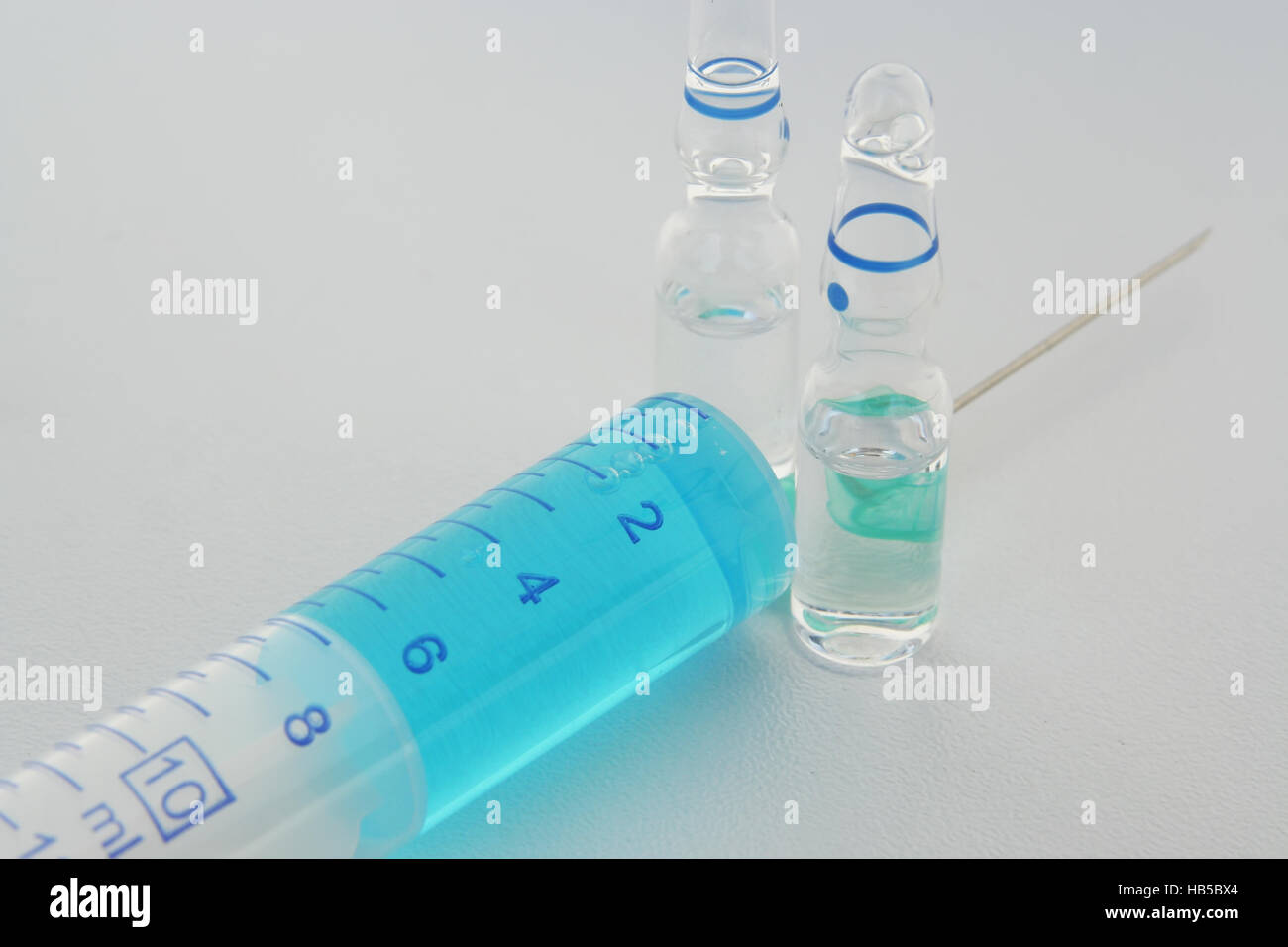 Syringe and ampule. Medical tools Stock Photo - Alamy