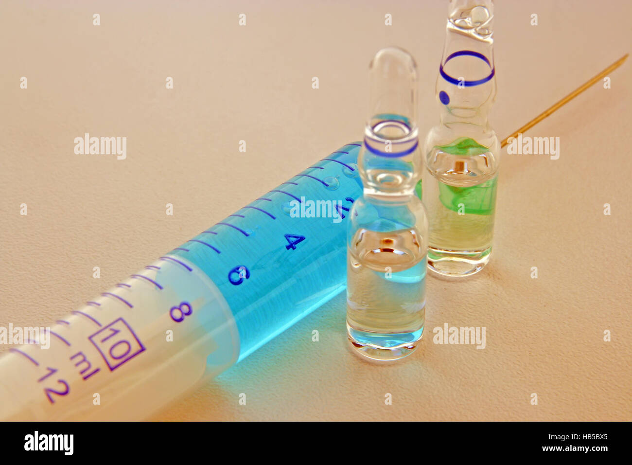 Syringe and ampule. Medical tools Stock Photo - Alamy
