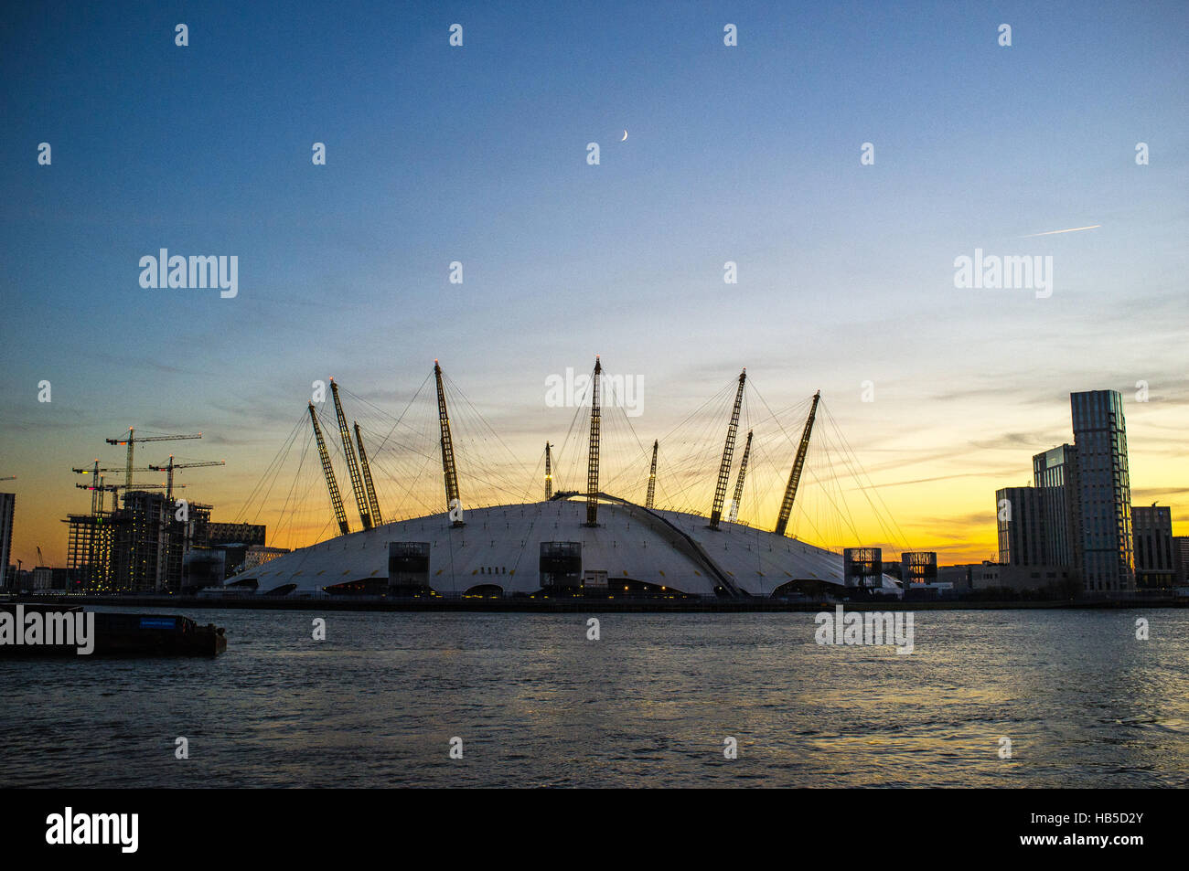 London, UK. 04th Dec, 2016. The Sunset on The O2 and the docks pictured ...
