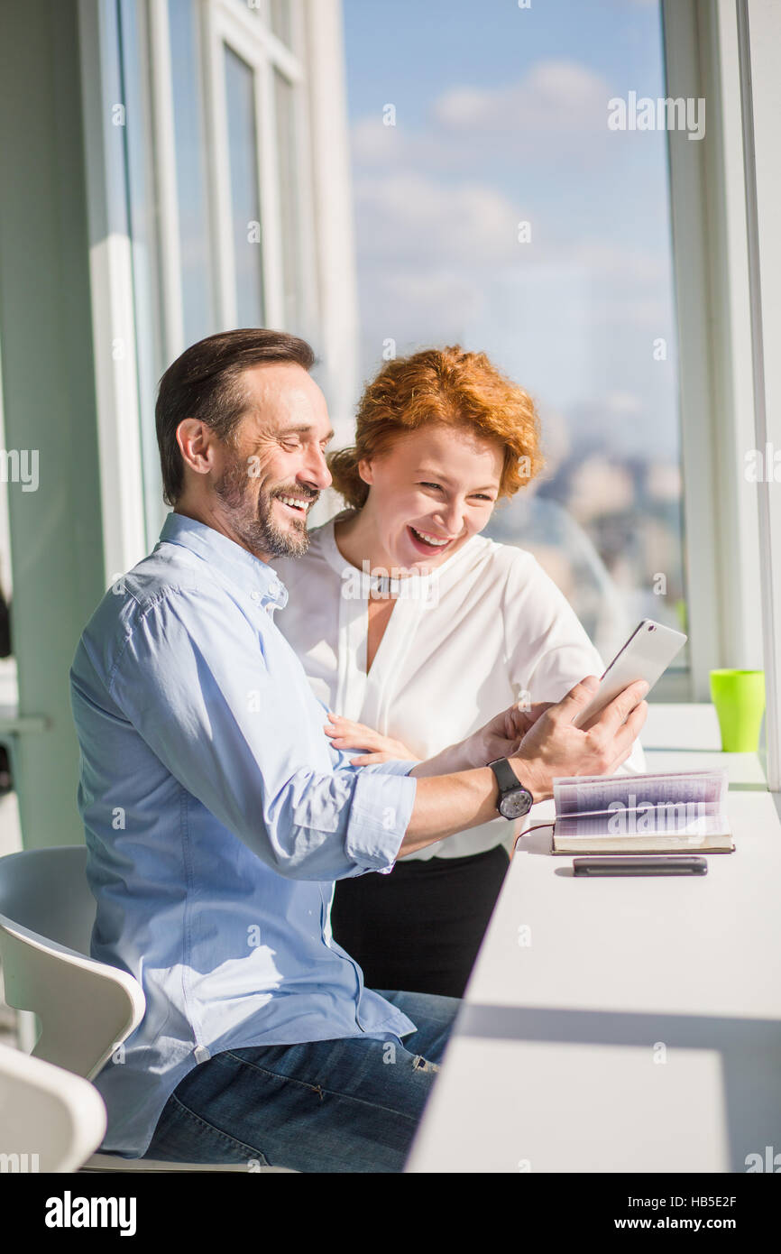 Business people having break during work in office interior Stock Photo ...