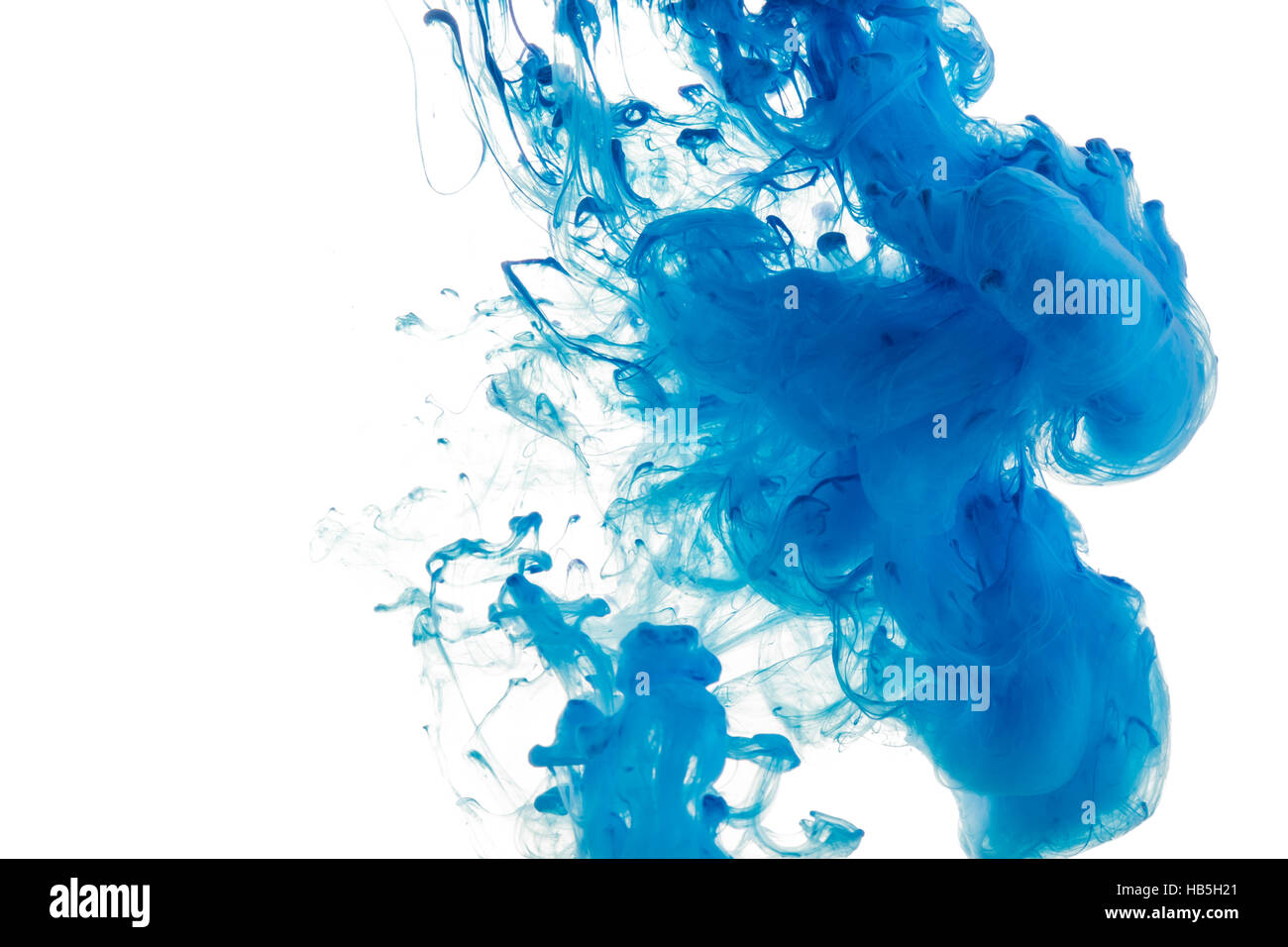 Abstract blue paint in water Stock Photo - Alamy