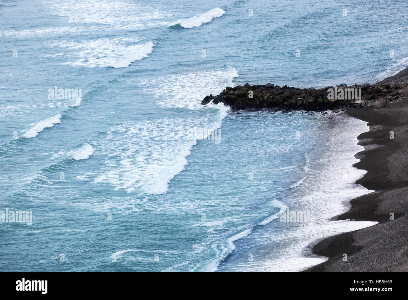 waves on pebble beach Stock Photo - Alamy
