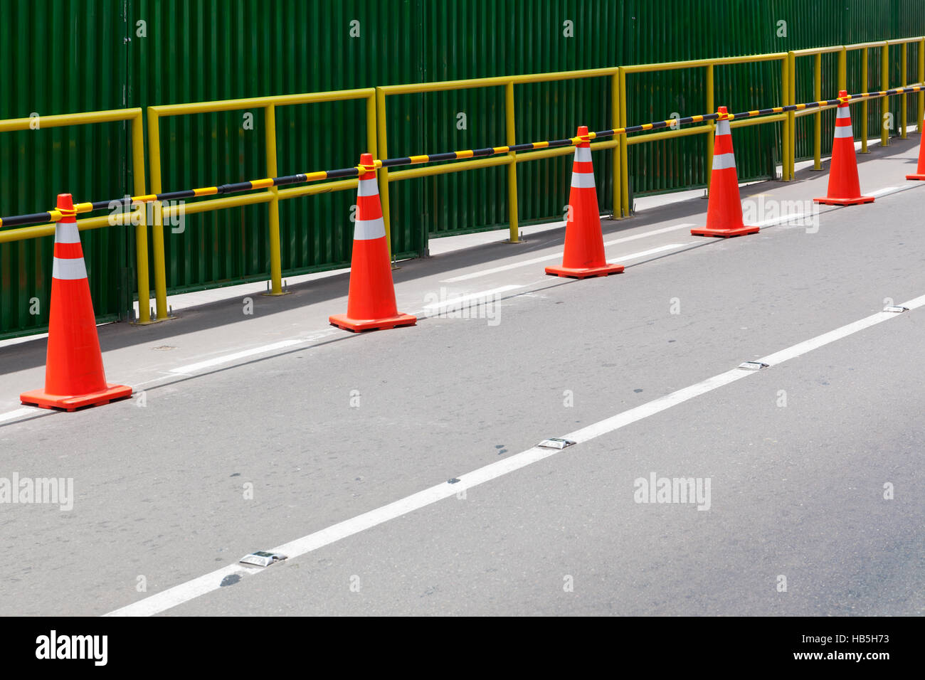 fence on the road Stock Photo - Alamy
